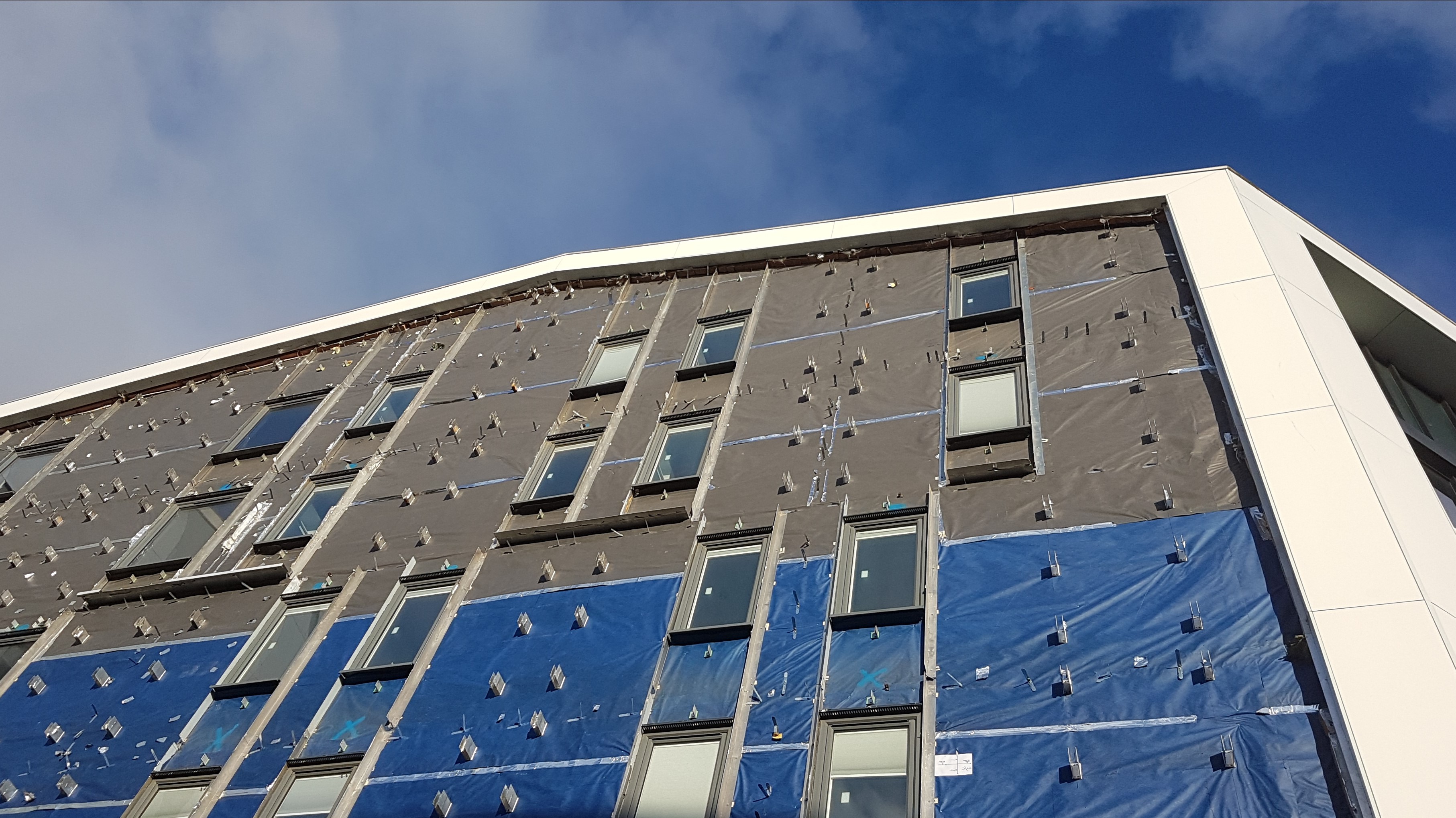 Cladding work fund launched for mid-size blocks | Journals | RICS